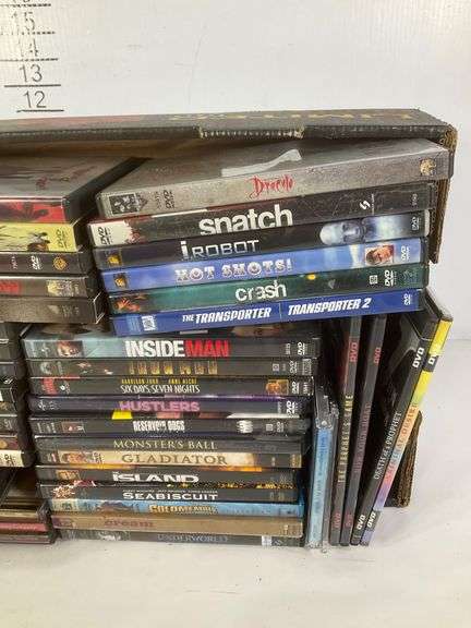 Assorted Collection of DVDs and CDs Featuring Movies and Music Albums ...
