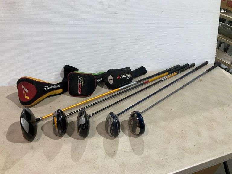 Collection of Golf Drivers with Covers from Various Brands - Hash Auctions