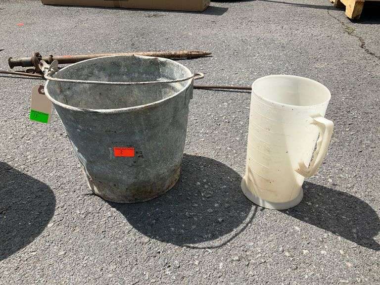 Galvanized Metal Bucket with Plastic Measuring Cup, From the Pope ...