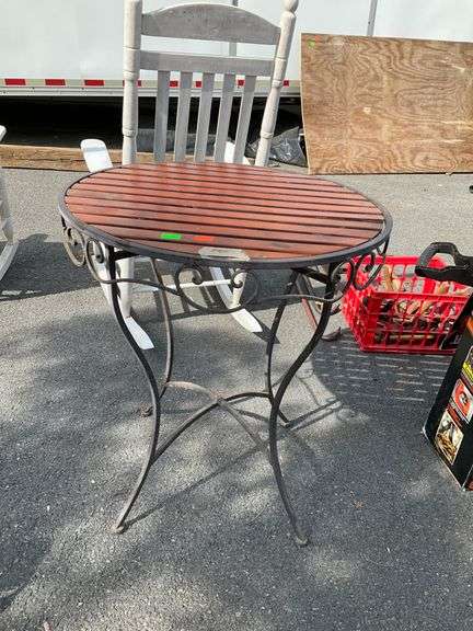 Patio Table with Slatted Wood Top and Metal Scroll Base - Hash Auctions