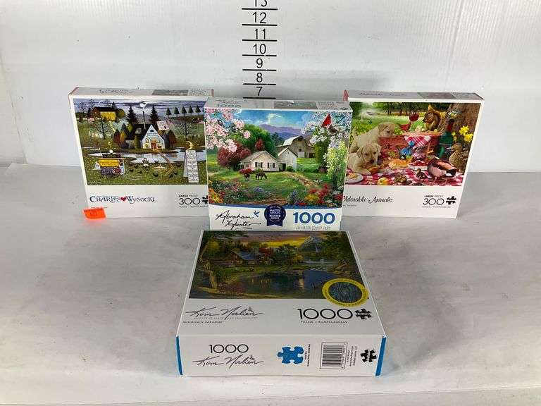 Collection of Four Jigsaw Puzzles Featuring Various Themes - Hash Auctions