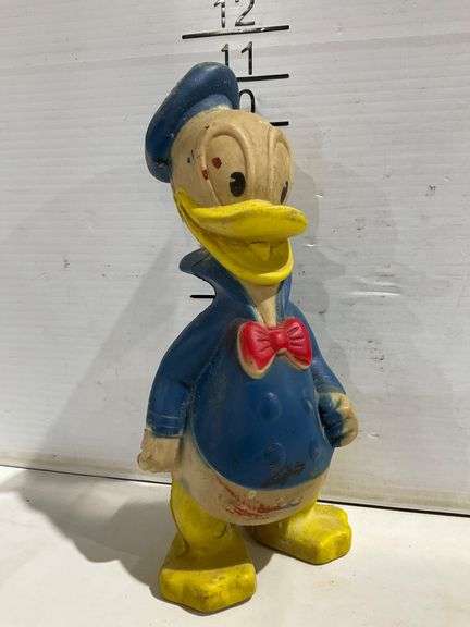 Rubber Figure of Donald Duck Character in Blue Outfit with Red Bow Tie ...