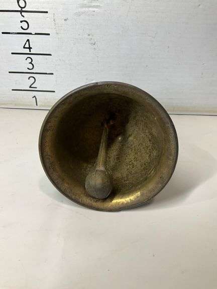 Cast Brass Decorative Bell with Handle and Engraved Motif - Hash Auctions