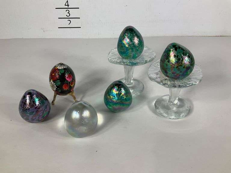 Collection of Decorative Eggs with Painted and Iridescent Designs on ...
