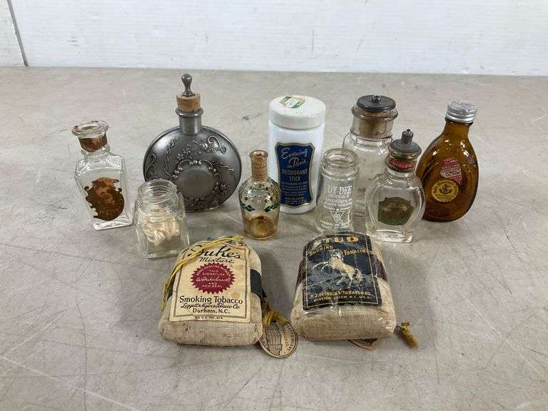 Assorted Vintage Glass Bottles, Tobacco Pouches, and Pewter Perfume ...