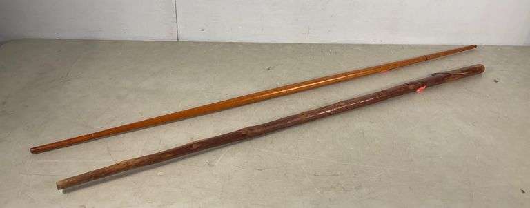 Two Walking Sticks with Natural and Stained Finishes - Hash Auctions