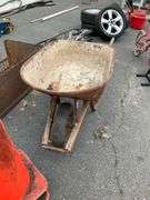 Wheelbarrow With Metal Hopper and Wooden Handles - Hash Auctions