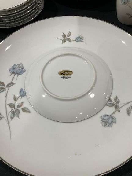 Two boxes: 51-Piece Dinnerware Set by Delux with Blue Floral Motif ...