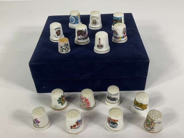 Collection of Ceramic Souvenir Thimbles with Varied Designs - Hash Auctions
