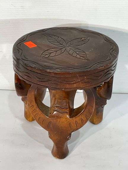 Carved Wood Stool with Decorative Leaf Motif and Animal-Inspired Legs ...