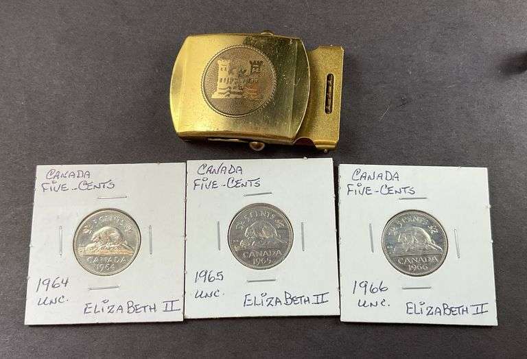 Solid brass belt buckle and three Canadian coins 1964-1966 - Hash Auctions