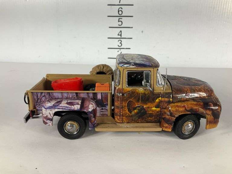 Die-Cast Model Pickup Truck with Hunting-Themed Graphics - Hash Auctions