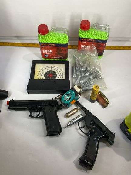 Two containers of Soft Air bb’s, target, CO2, Taurus BB gun, and a Co2 ...
