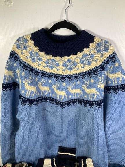 Collection of Four Knit Sweaters Featuring Various Patterns and Designs ...