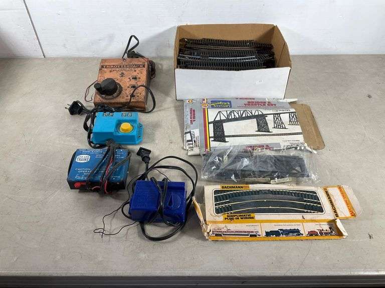 Collection of Model Train Transformers, Tracks, and Accessories - Hash ...