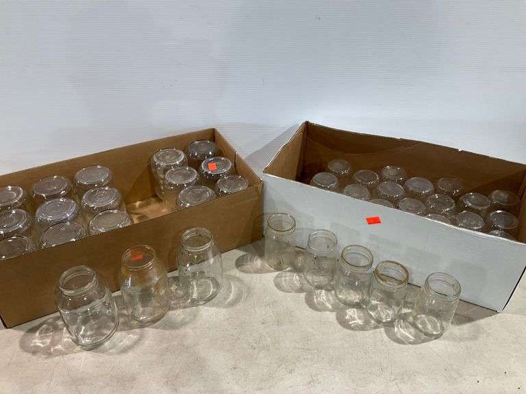 Assorted Clear Glassware Including Jars and Tumblers - Hash Auctions