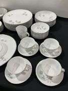 Two boxes: 51-Piece Dinnerware Set by Delux with Blue Floral Motif ...