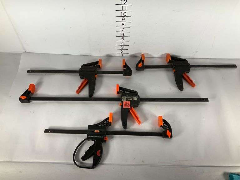 Four Bar Clamps with Orange and Black Plastic Handles - Hash Auctions