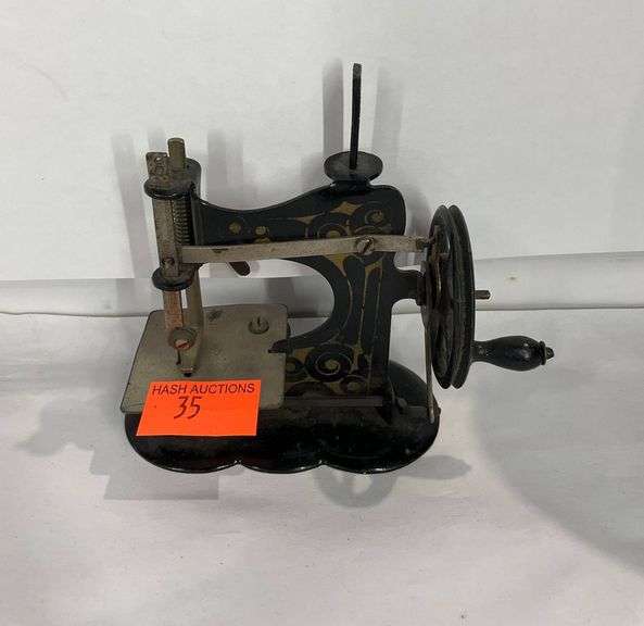 Vintage Hand-Crank Miniature Sewing Machine with Painted Details ...