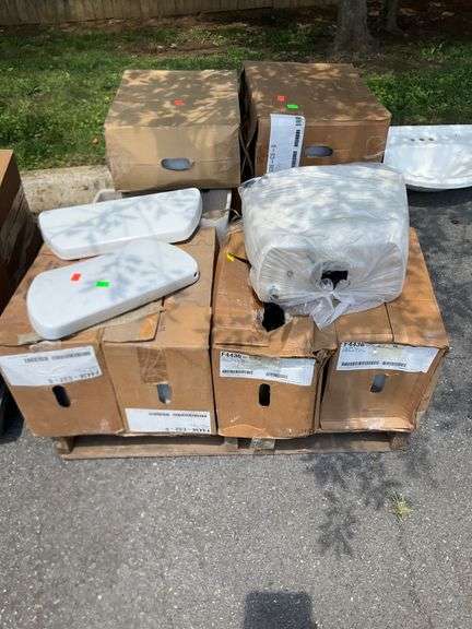 Pallet of White Ceramic Toilet Tanks in Original Packaging - Hash Auctions