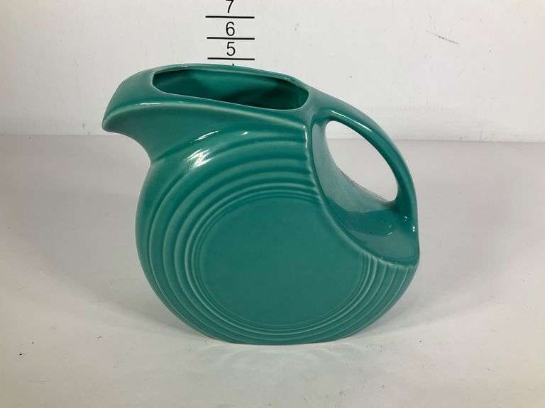 Fiesta Turquoise Disk Pitcher with Embossed Maker’s Mark - Hash Auctions