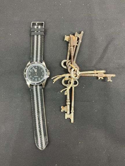 Quartz wrist watch not running and 8 skeleton keys - Hash Auctions