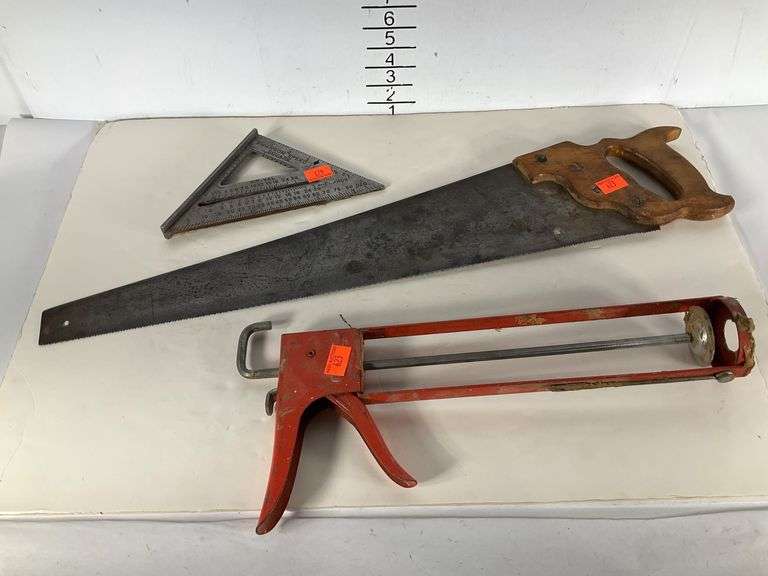 Three Tools Including Hand Saw, Swanson Speed Square, and Caulking Gun - Hash Auctions
