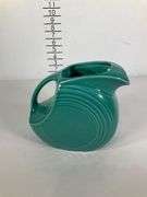Fiesta Turquoise Disk Pitcher with Embossed Maker’s Mark - Hash Auctions