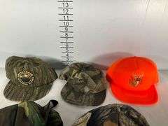 Six Camouflage and Hunting-Themed Caps - Hash Auctions
