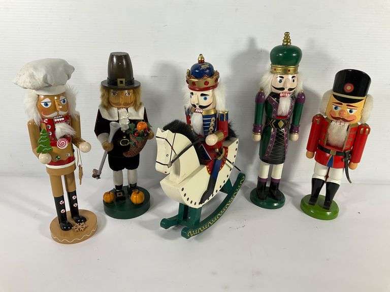 Five Painted Nutcracker Figures with Thematic Designs - Hash Auctions