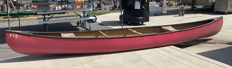 Old Town Canoe Company Red Canoe with Plastic Construction - Hash Auctions