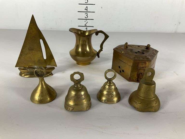 Brass Decorative Items Including Bells, Pitcher, and Nautical Figurine ...
