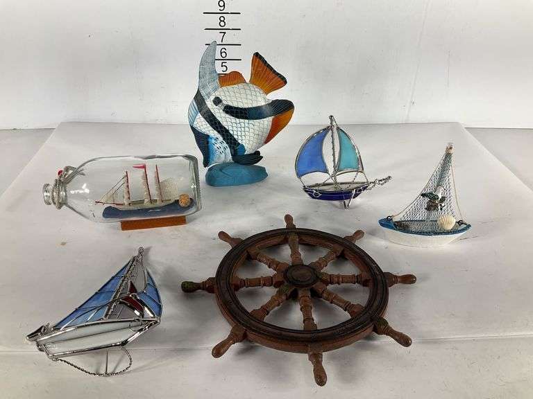 Nautical Themed Decorative Items Including Ship Models, Wheel, and Fish ...