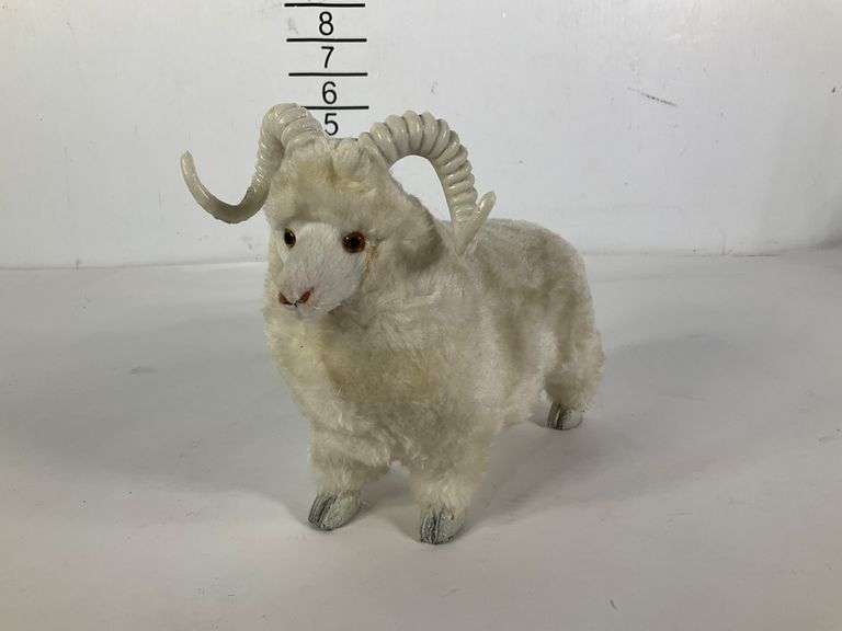 Plush Ram Figurine with Curled Horns and Faux Fur Detailing - Hash Auctions