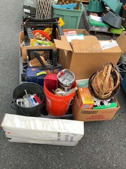 Miscellaneous items on Pallets Lot, camel saddle, nails, baskets, etc ...