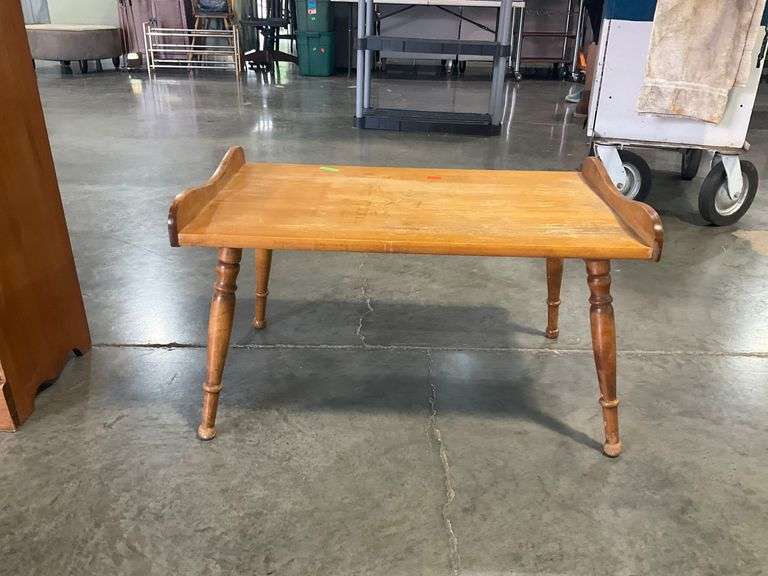 Coffee Table with Curved Side Rails and Turned Legs - Hash Auctions