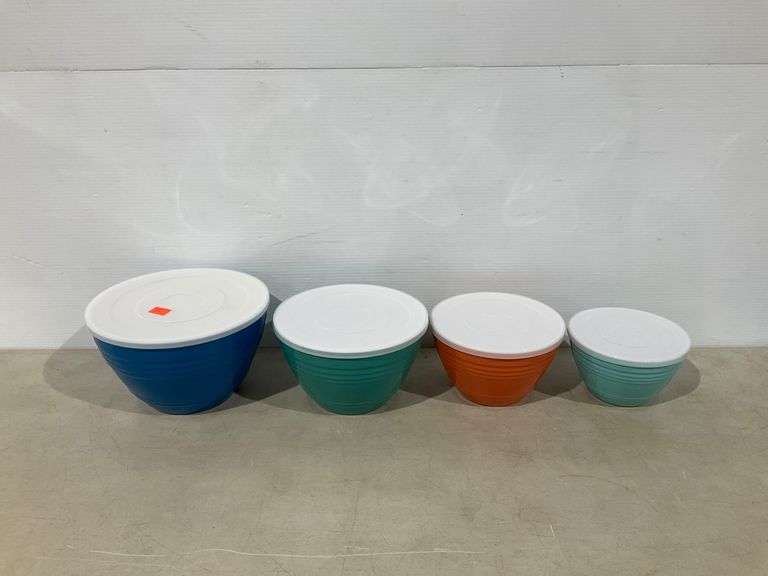 Four Multicolored Plastic Nesting Bowls with Lids - Hash Auctions