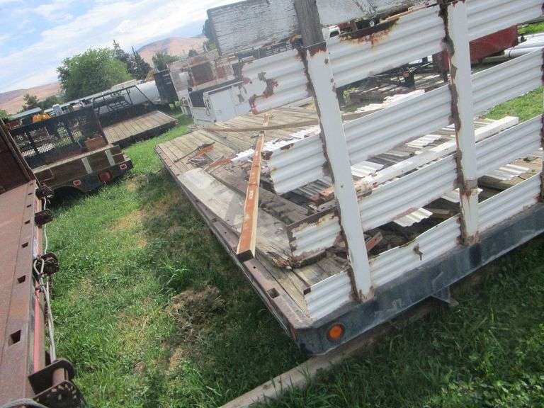 8X20 FLATBED W/RACKS - Heaverlo Northwest Auctions