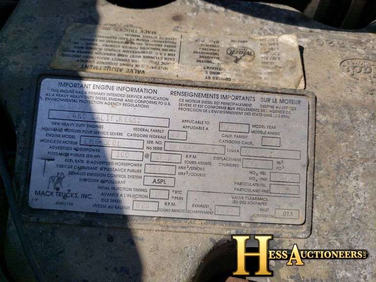 1991 MACK RD690S ROLL OFF TRUCK - Hess Auctioneers