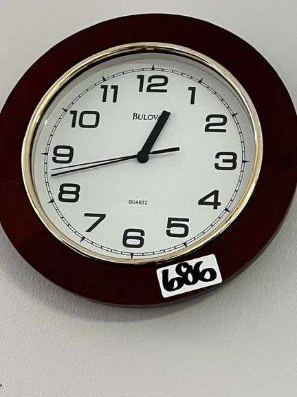 BULOVA 12" WALL CLOCK - Dallas Online Auction Company