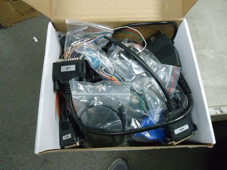 NEW! AUTOMOTIVE PROGRAMMING CORDS - Dallas Online Auction Company