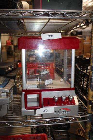THE CLAW COUNTERTOP TOY CLAW MACHINE - Dallas Online Auction Company