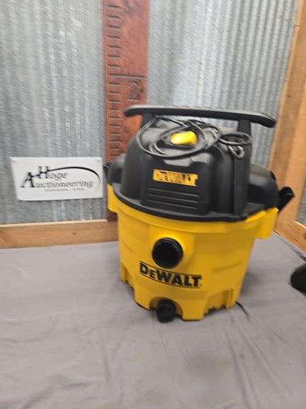 Dewalt nine gallon corded wet/ drive vac. Works - Hoge Auctioneering LLC