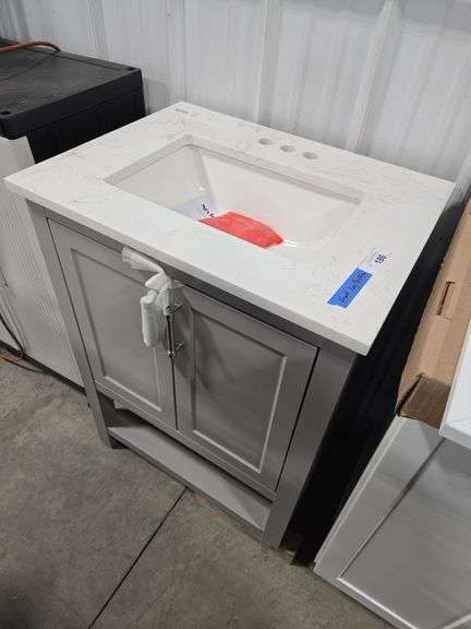 Vanity with sink. No faucet, front leg broke. Approx 24"w. 18"d. 35"t - Hoge Auctioneering LLC