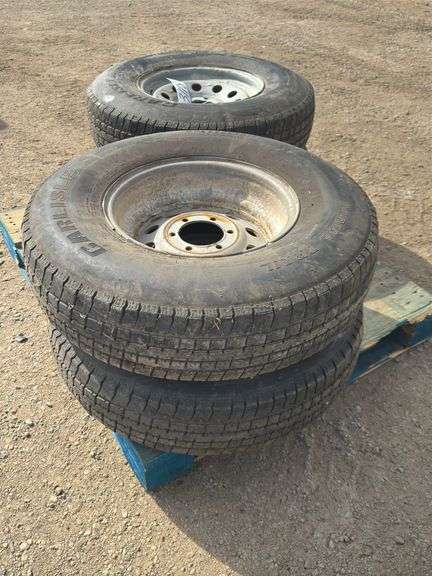 MONEY X 4--TIRE & RIMS, 235/85R16 - Hoge Auctioneering LLC