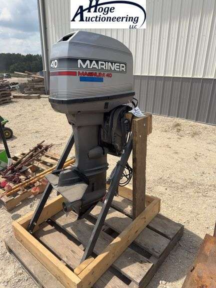 MARINER MAGNUM 40 OUTBOARD MOTOR ON WOOD STAND, W/ BOOK - Hoge ...