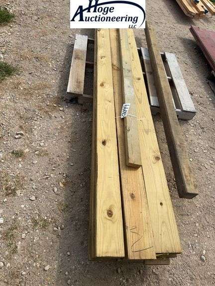 PALLET-- (9) 2X5X12 FT, WOOD POST 8 FT - Hoge Auctioneering LLC