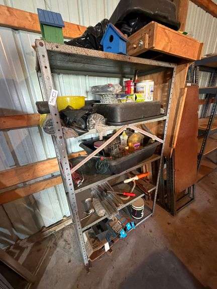 metal rack with contents on shelves included - Hoosier Auction Group