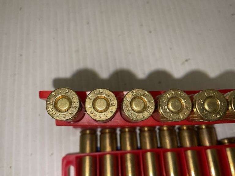 (17) 7x57mm Mauser cartridges and three empty brass casings & Four 222 ...