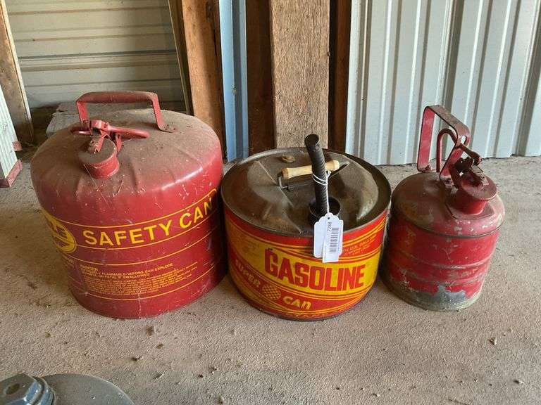 Three metal fuel cans - Hurley Real Estate & Auctions